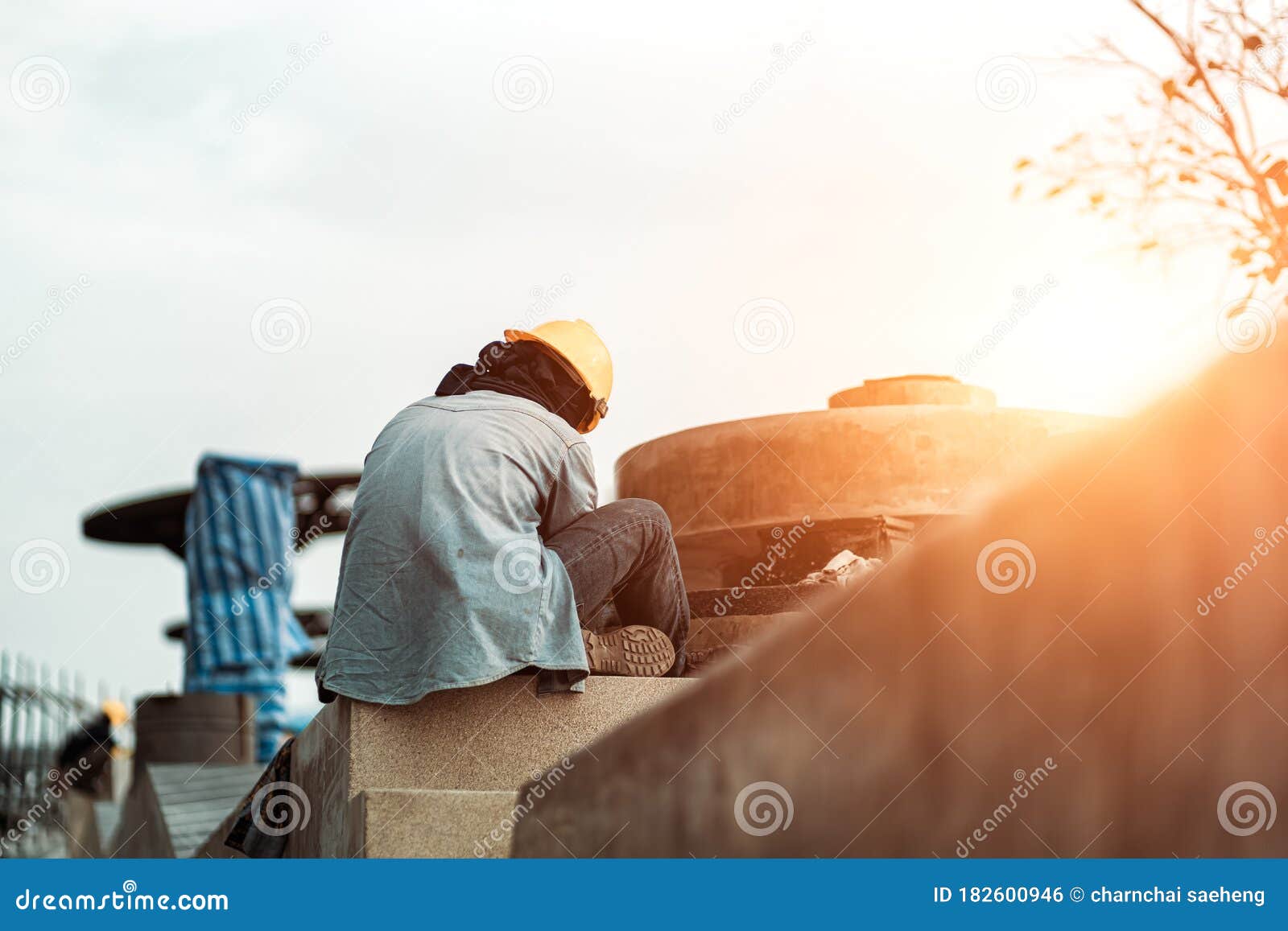 Construction Worker Sitting and Working at Site Construction at Island ...