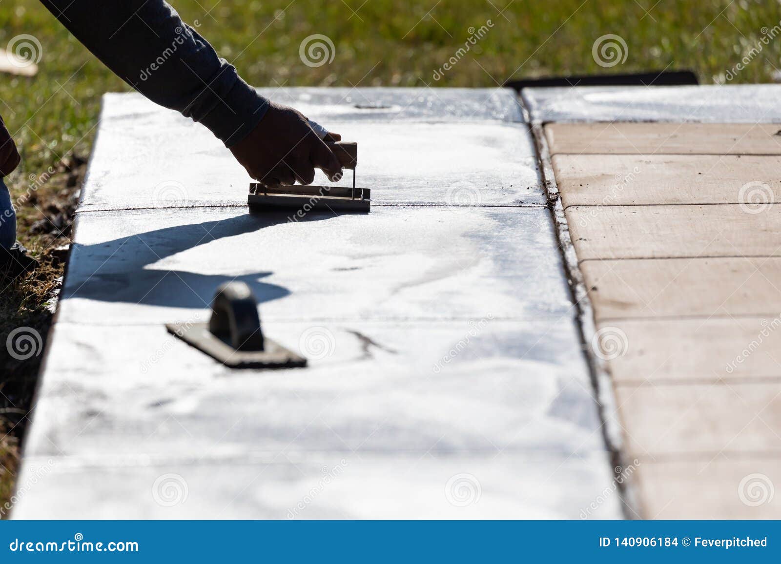 Construction Worker Smoothing Wet Cement with Hand Edger Tool Stock ...
