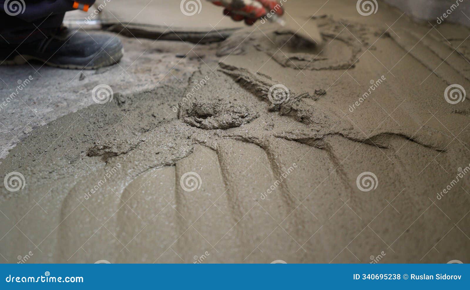 Construction Worker Spreading Concrete Mix with Trowel Stock Photo ...
