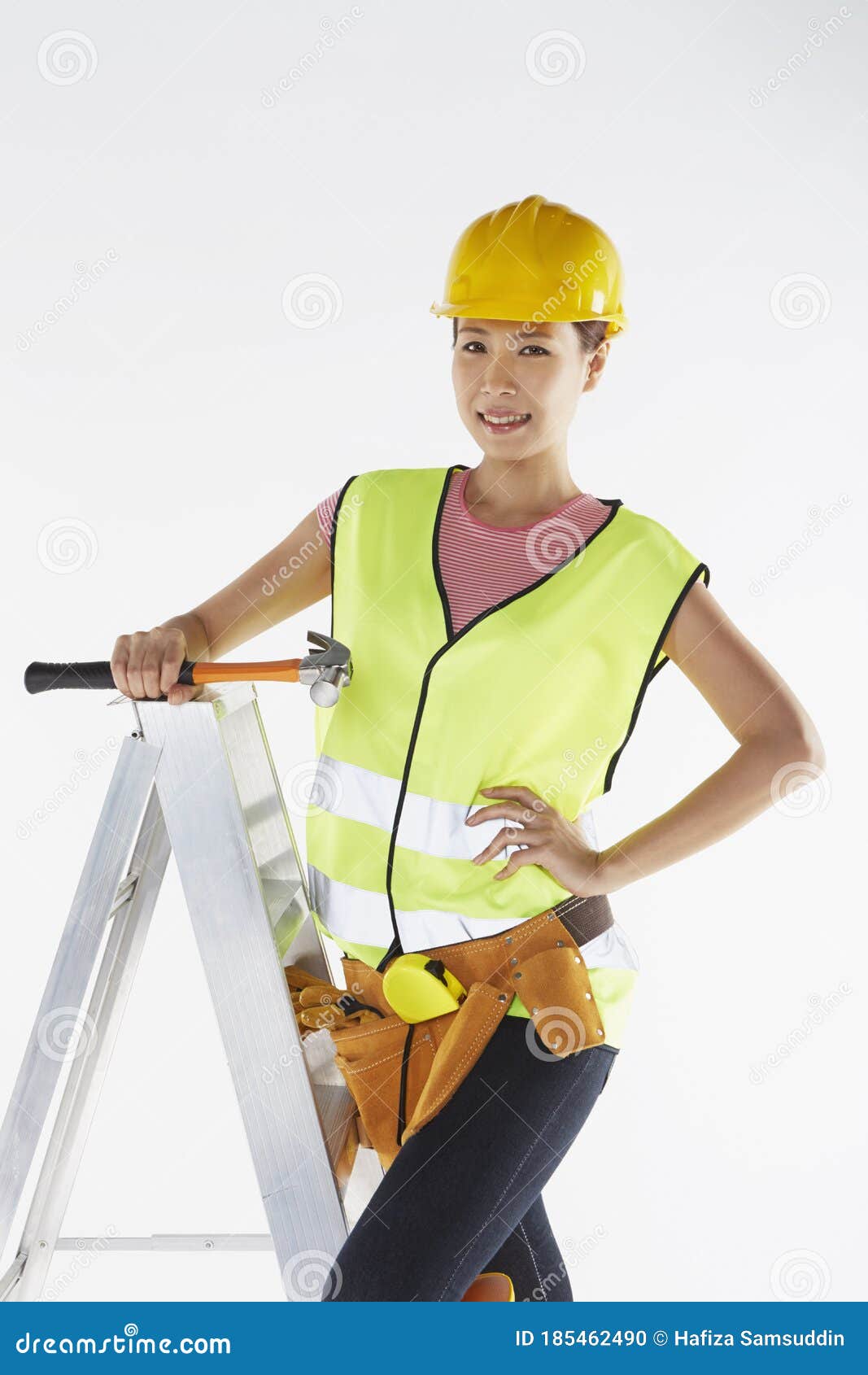 Construction Worker Standing on Ladder, Holding a Hammer Stock Photo ...
