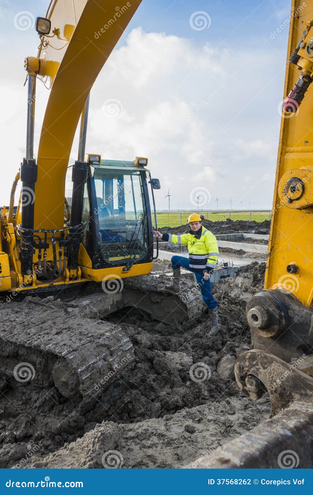 Construction Worker Standing Proudly Next To His Excavator Stock Photo ...