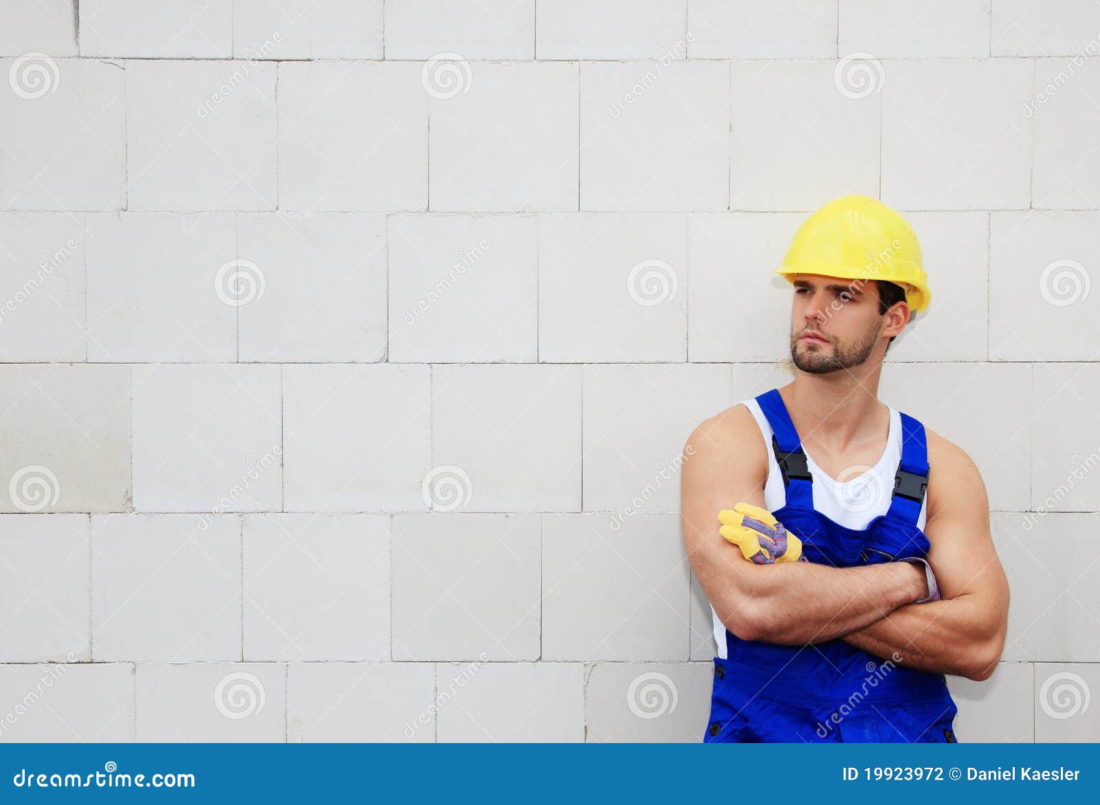 Construction Worker Standing at Wall Stock Photo - Image of wall ...