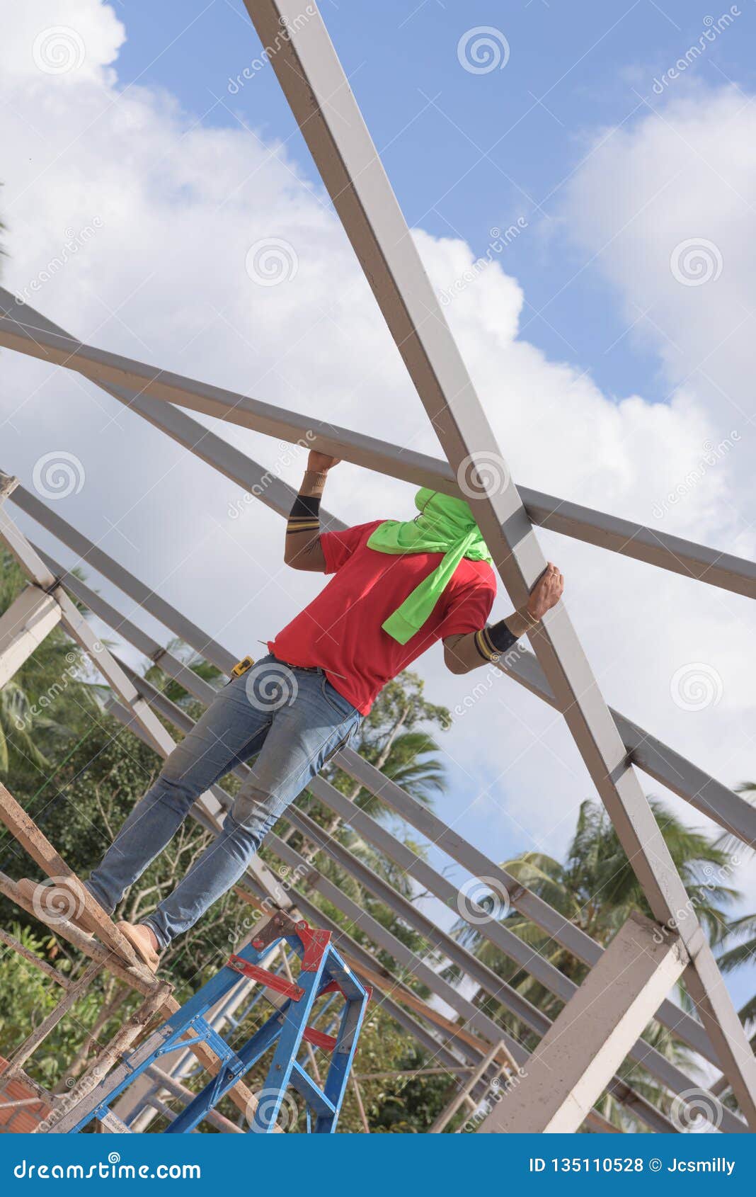 Construction Worker Straddling a Steel Beam of a Building Stock Photo ...