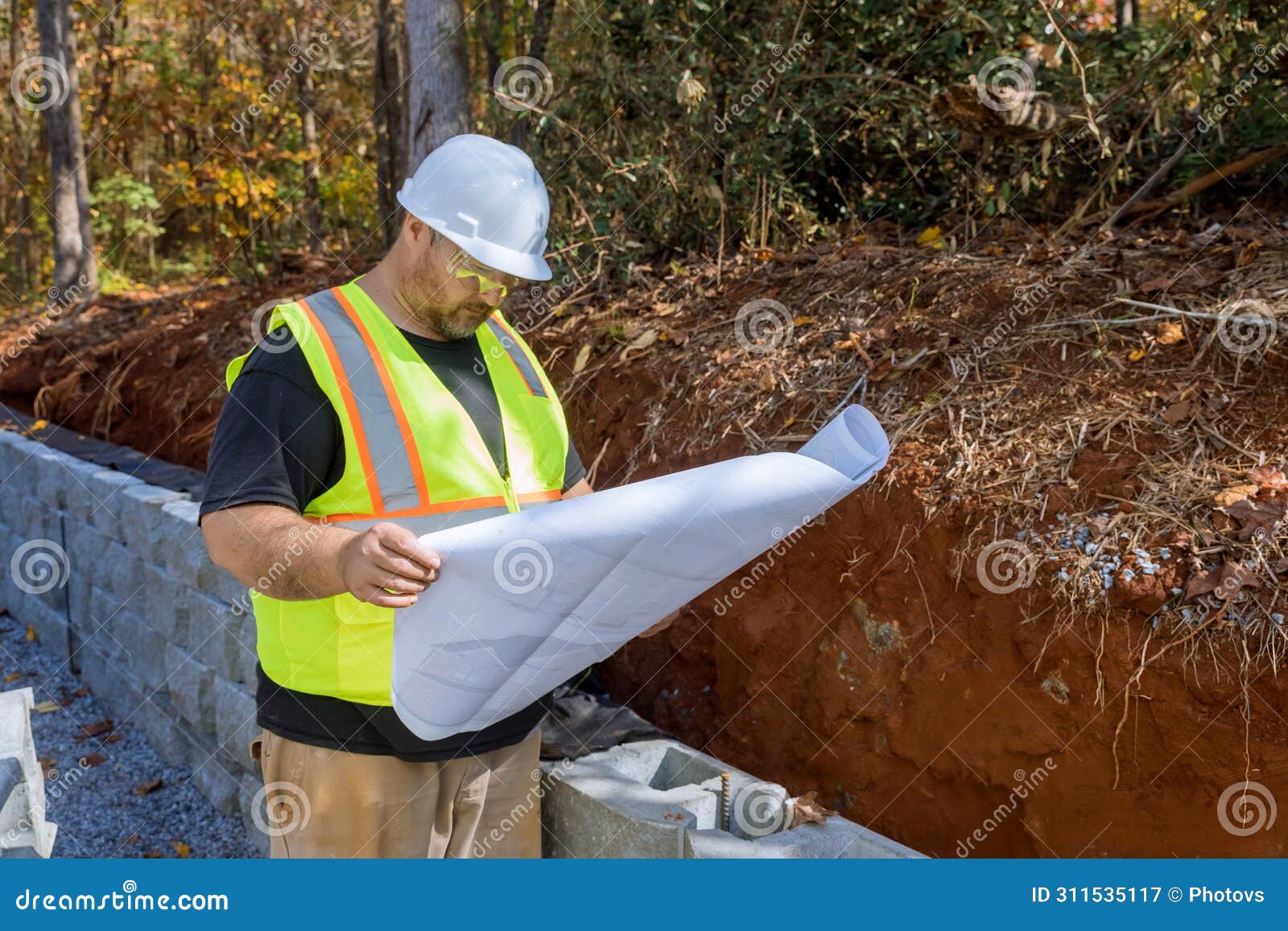 Construction Worker Studies Used by Blueprint Plan when Mounting ...