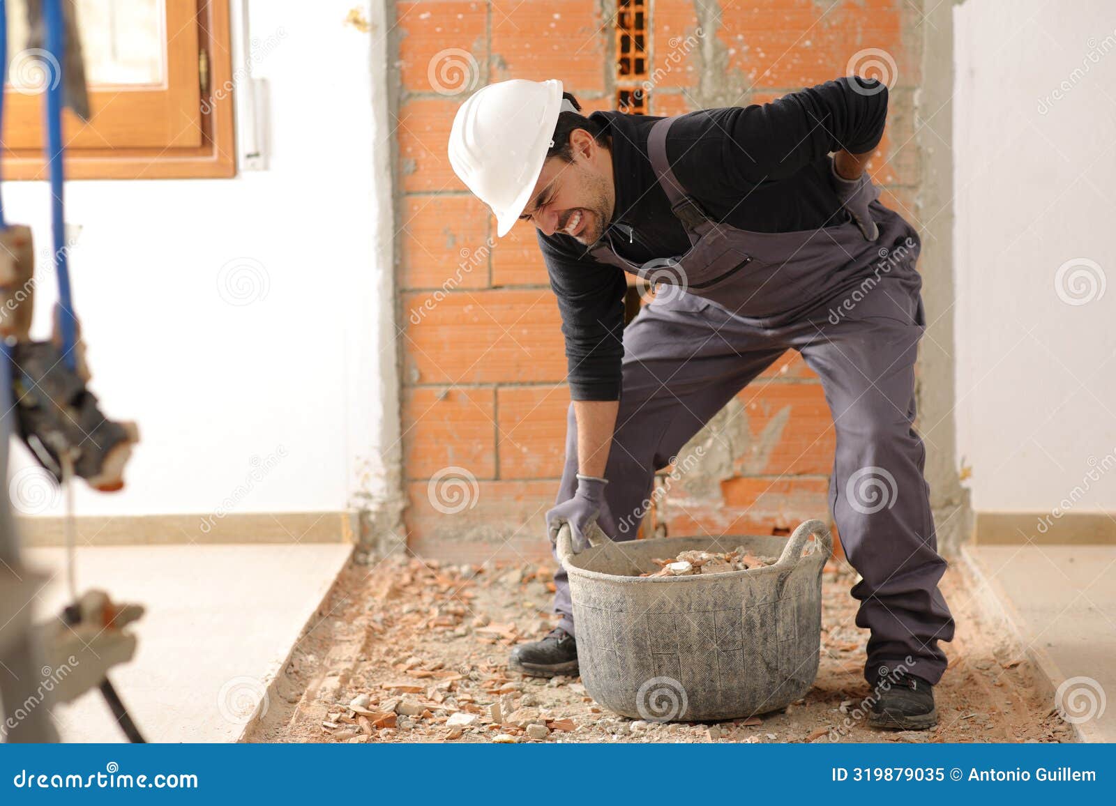 Construction Worker Suffering Back Ache Lifting Work Carrycot Stock ...