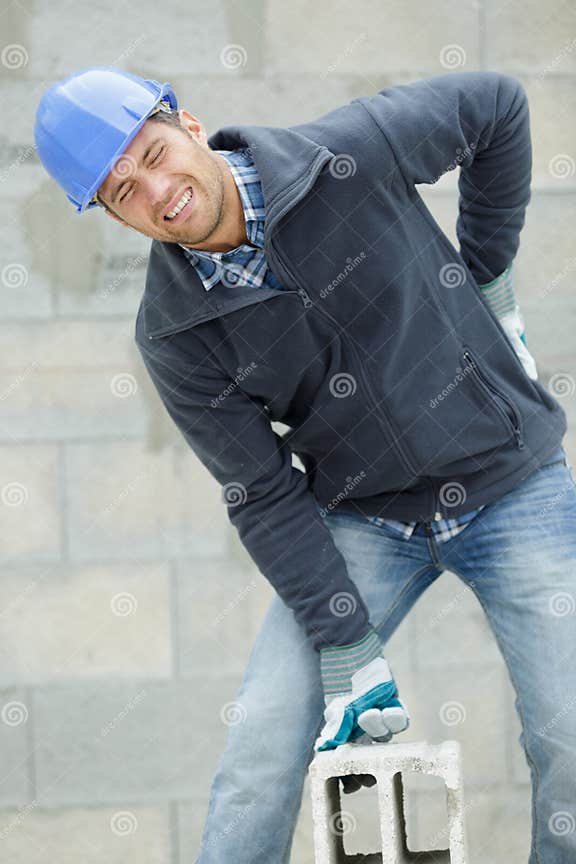Construction Worker Suffering from Back Injury Stock Photo - Image of ...