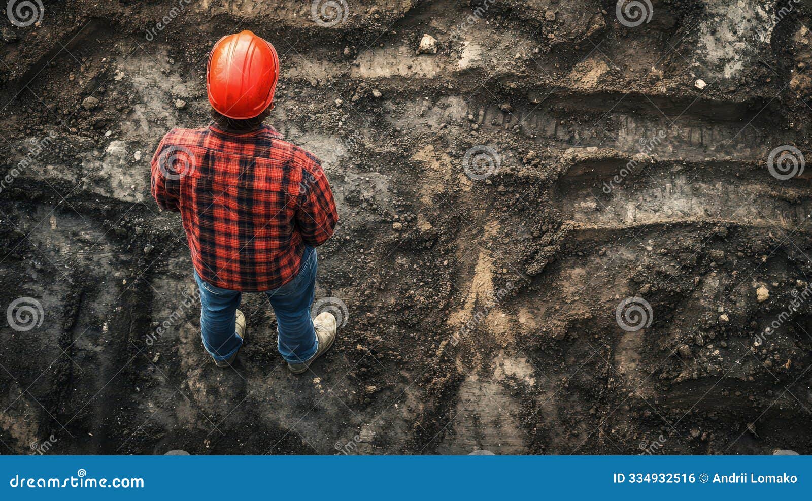 Construction Worker Surveying Freshly Dug Soil at a Worksite Stock ...