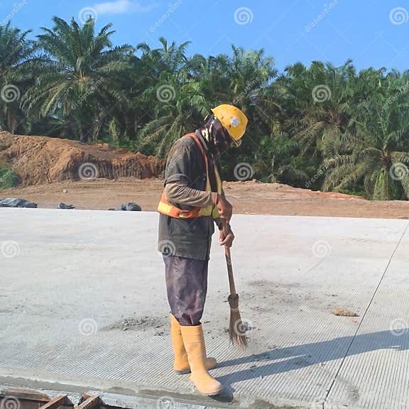 A Construction Worker is Sweeping Stock Image - Image of vacation ...