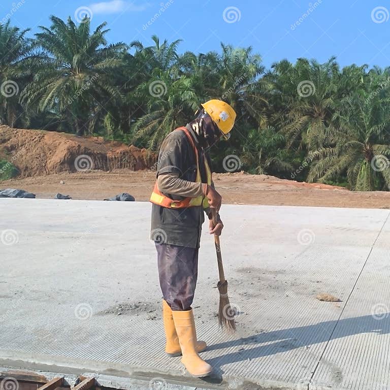 A Construction Worker is Sweeping Stock Image - Image of vacation ...