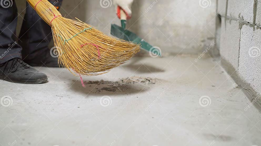 Construction Worker Sweeping Dust with Broom and Dustpan Stock Image ...