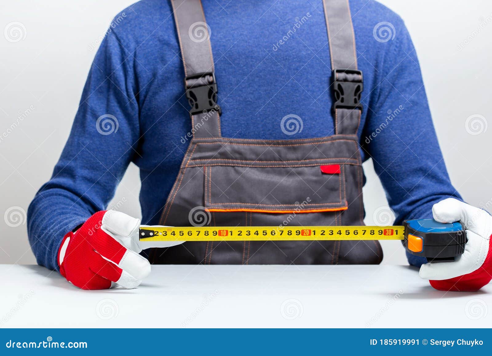 Construction Worker Takes Measuring. Stock Image - Image of person ...
