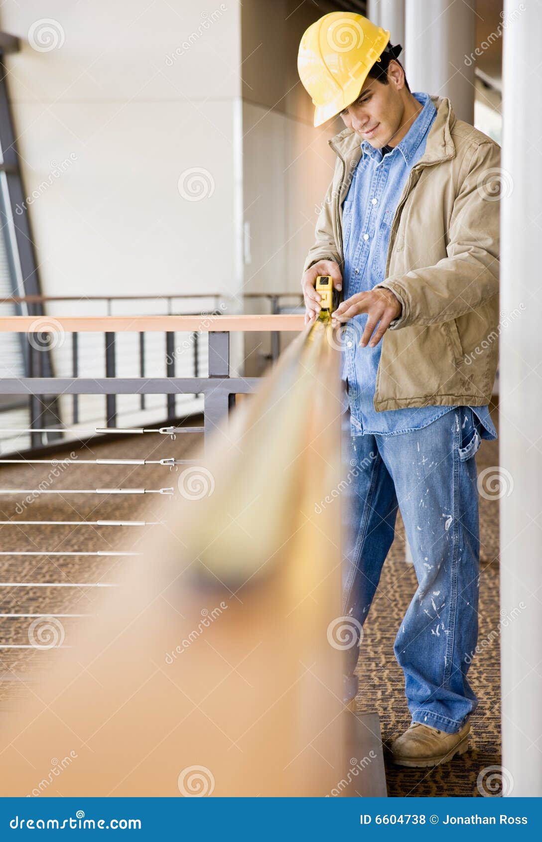 Construction Worker Taking Measurement Stock Photo - Image of skill ...