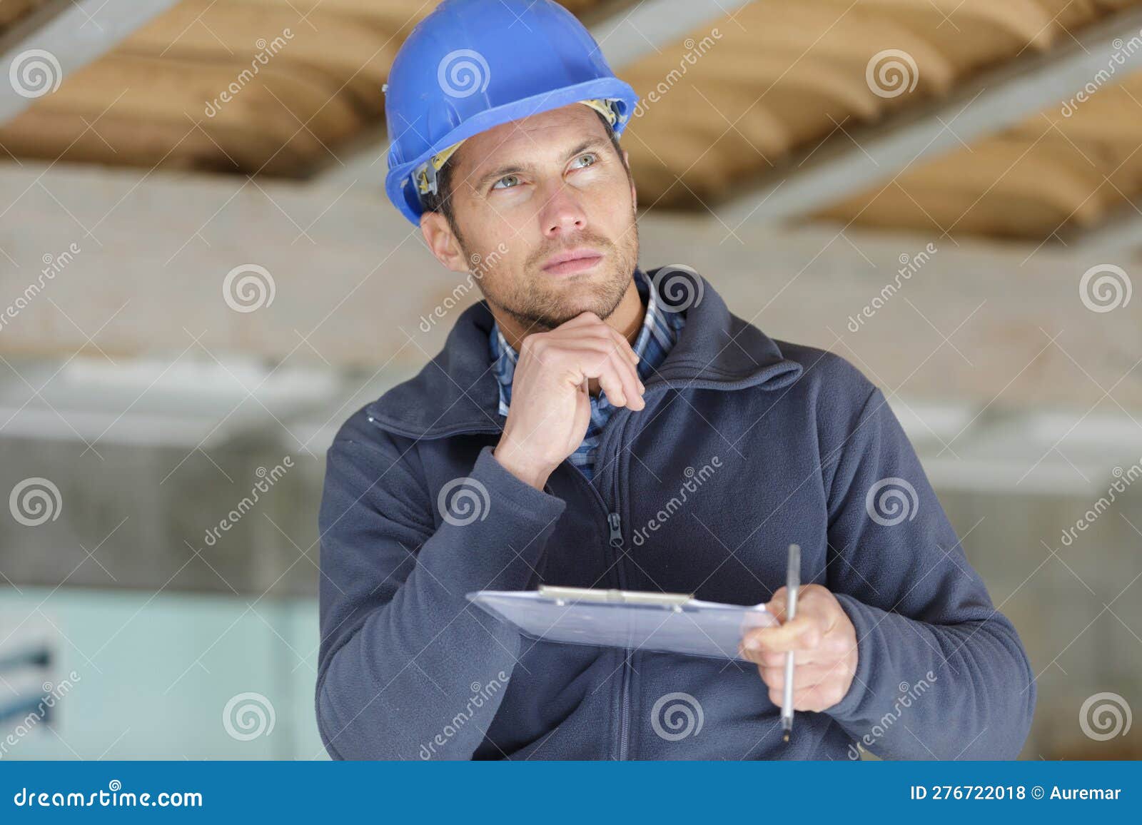Construction Worker Taking Notes Stock Photo - Image of indoor ...