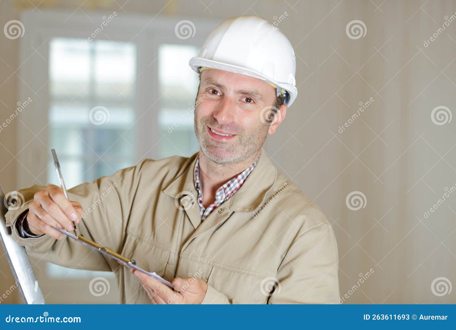 Construction Worker Taking Notes on Clipboard Stock Image - Image of ...