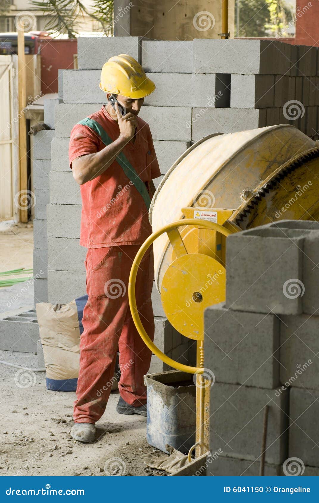Construction Worker Talks on Cell Phone - Vertical Stock Photo - Image ...