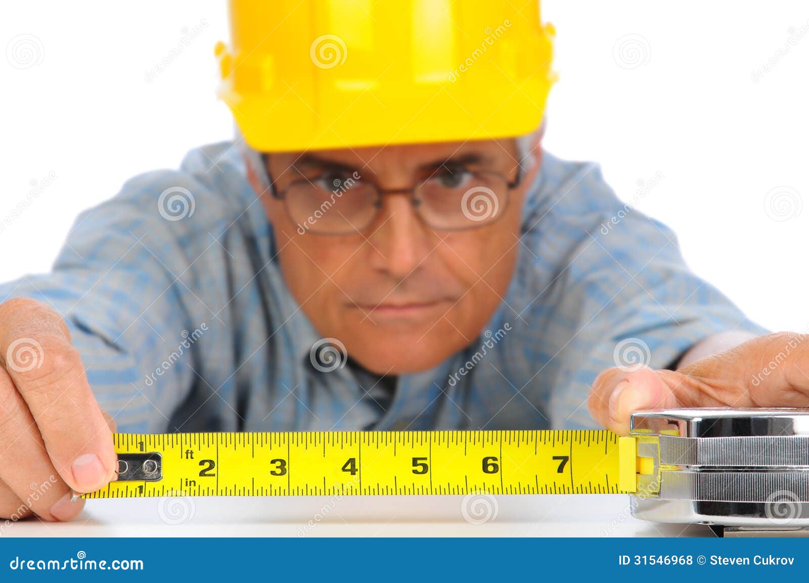 Construction Worker with Tape Measure Stock Photo - Image of white ...