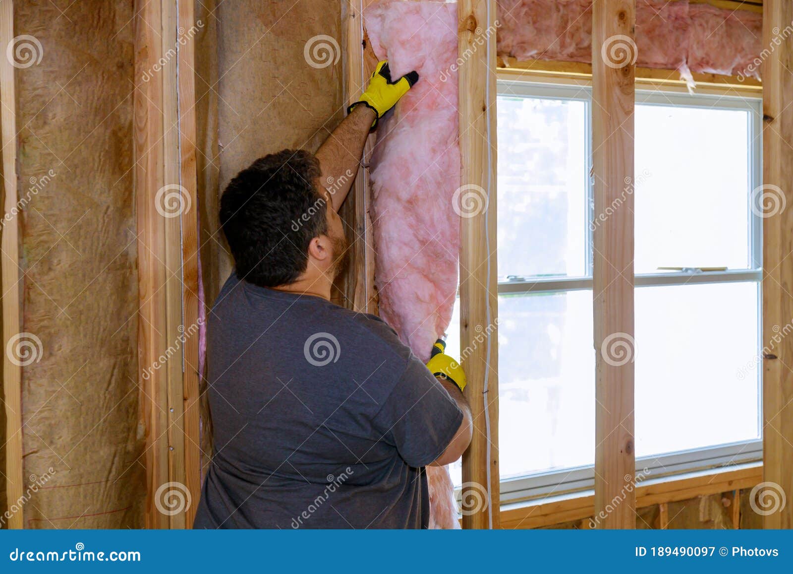 Construction Worker Thermally Insulating Layer Under House with Glass ...