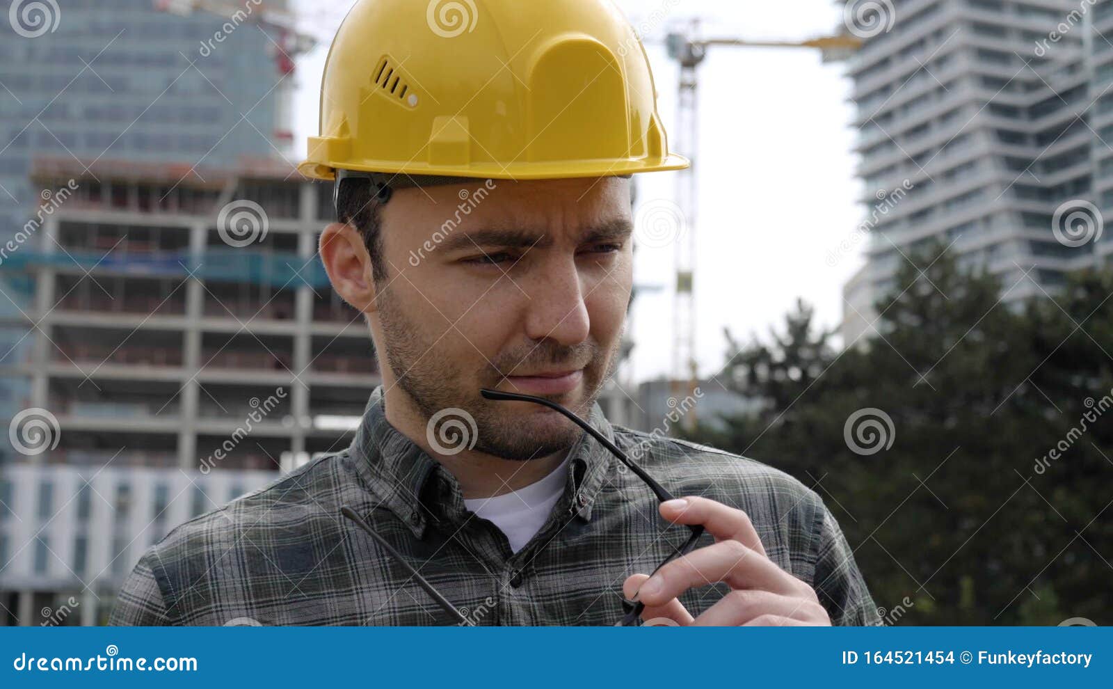 Construction Worker Thinking Standing in Front of the Construction Site ...