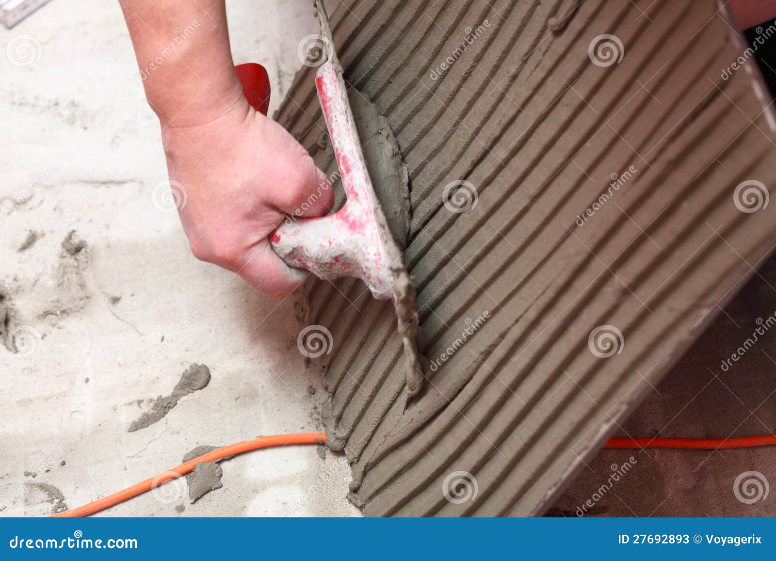 Construction Worker is Tiling at Home Tile Floor Stock Image - Image of ...
