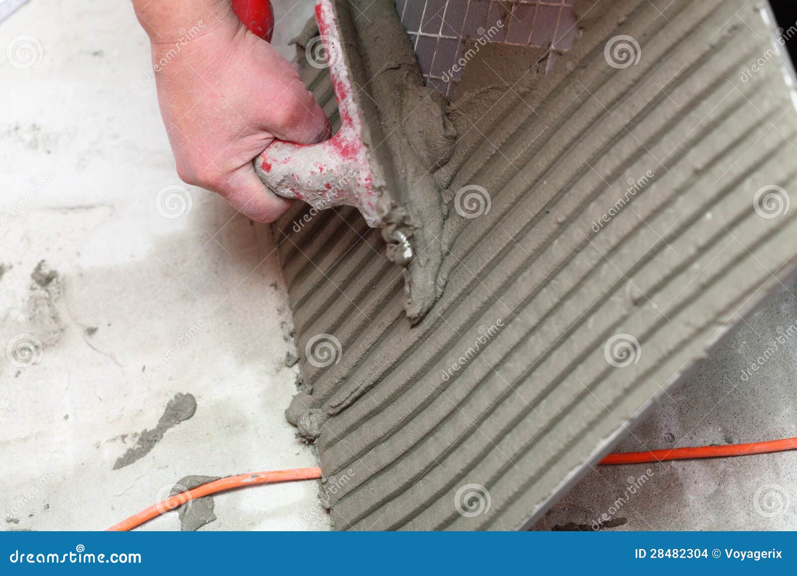 Construction Worker is Tiling at Home Tile Floor Adhesive Stock Photo ...