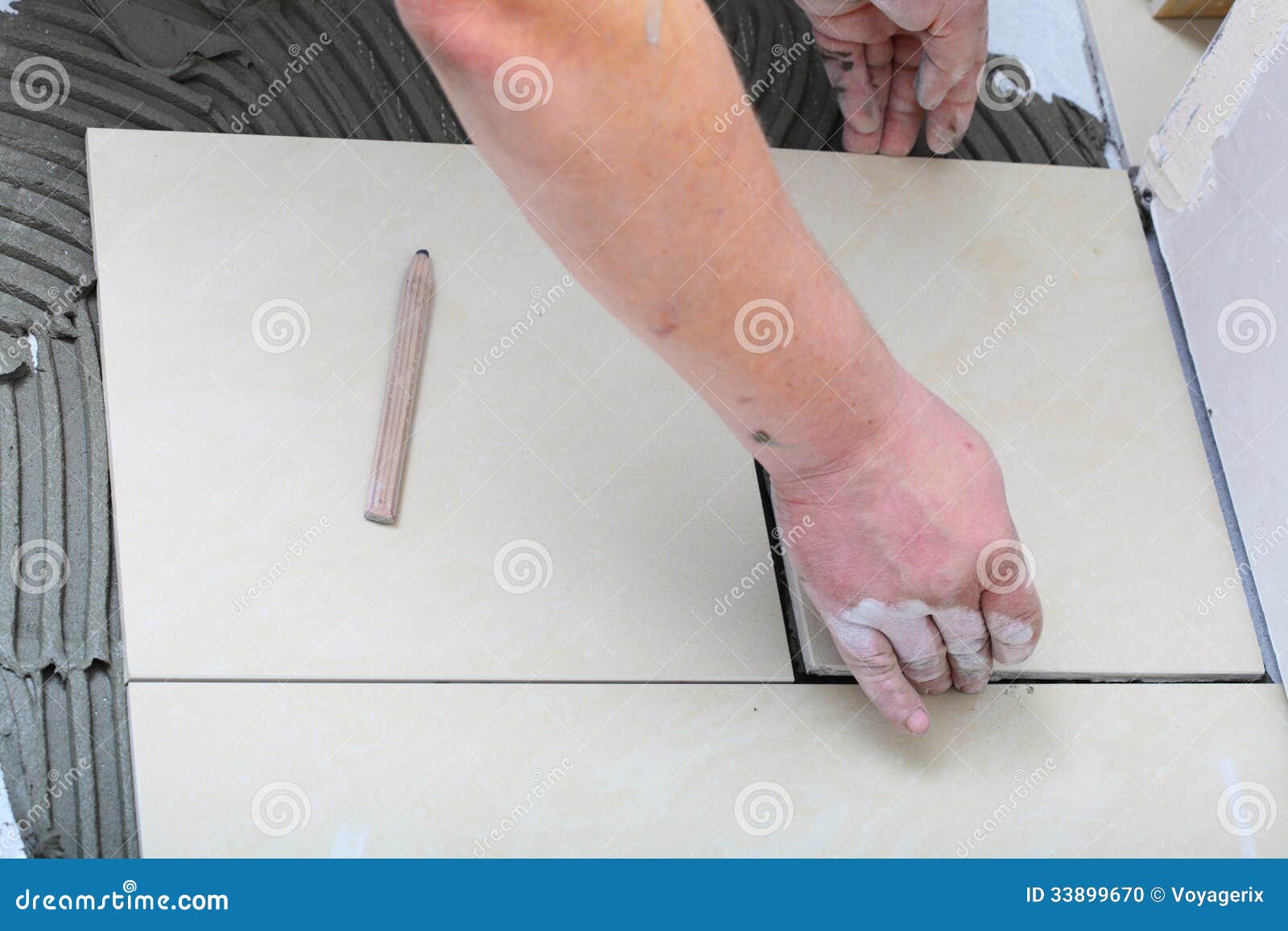 Construction Worker is Tiling at Home, Tile Floor Adhesive Stock Photo ...