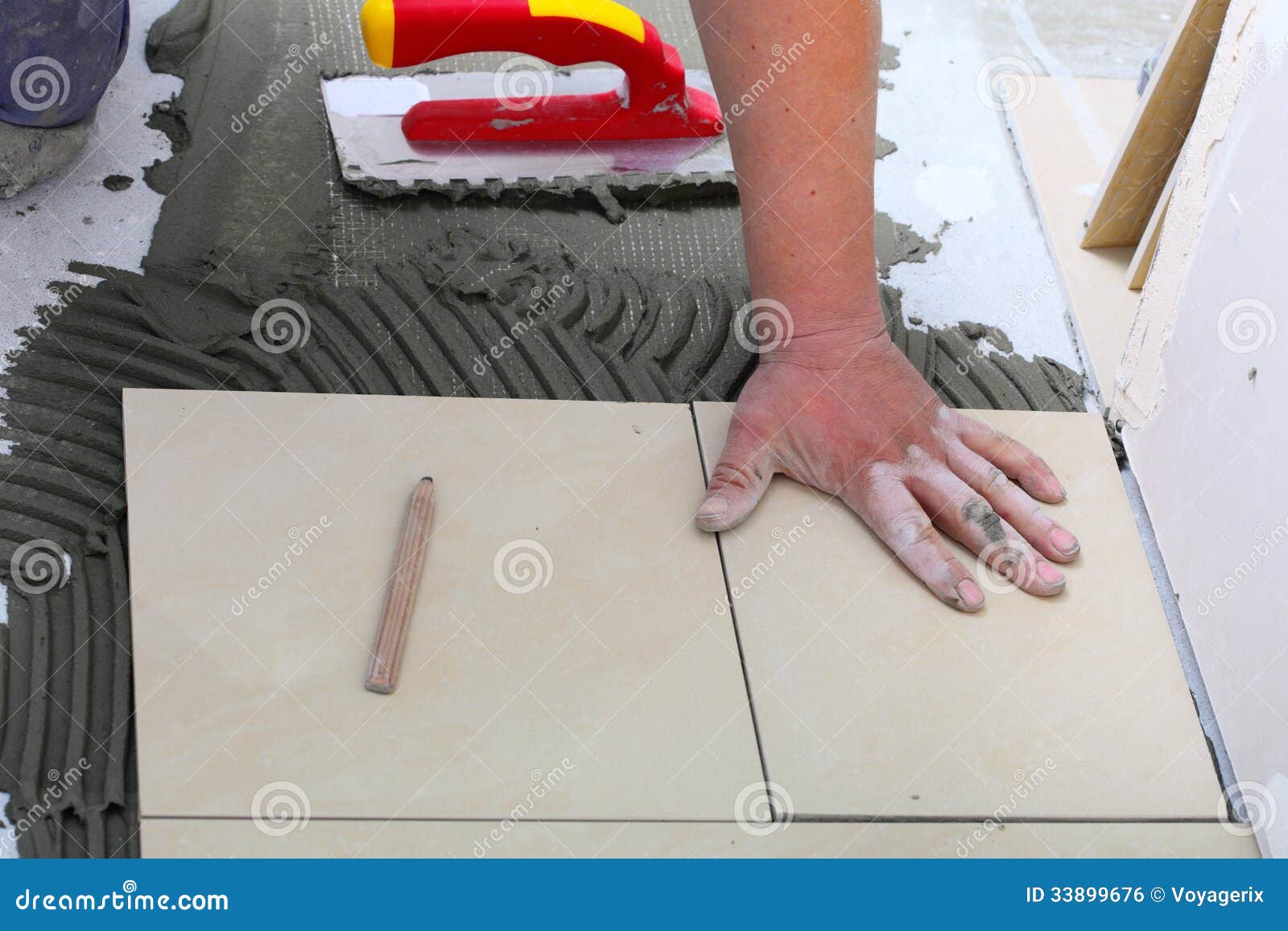 Construction Worker is Tiling at Home, Tile Floor Adhesive Stock Photo ...