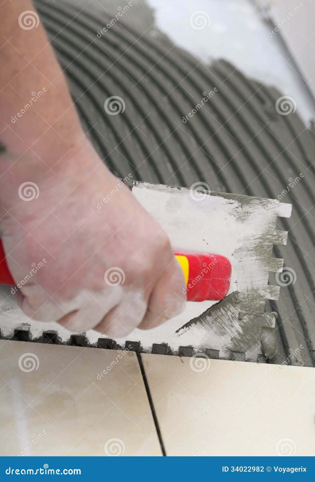 Construction Worker is Tiling at Home, Tile Floor Adhesive Stock Photo ...