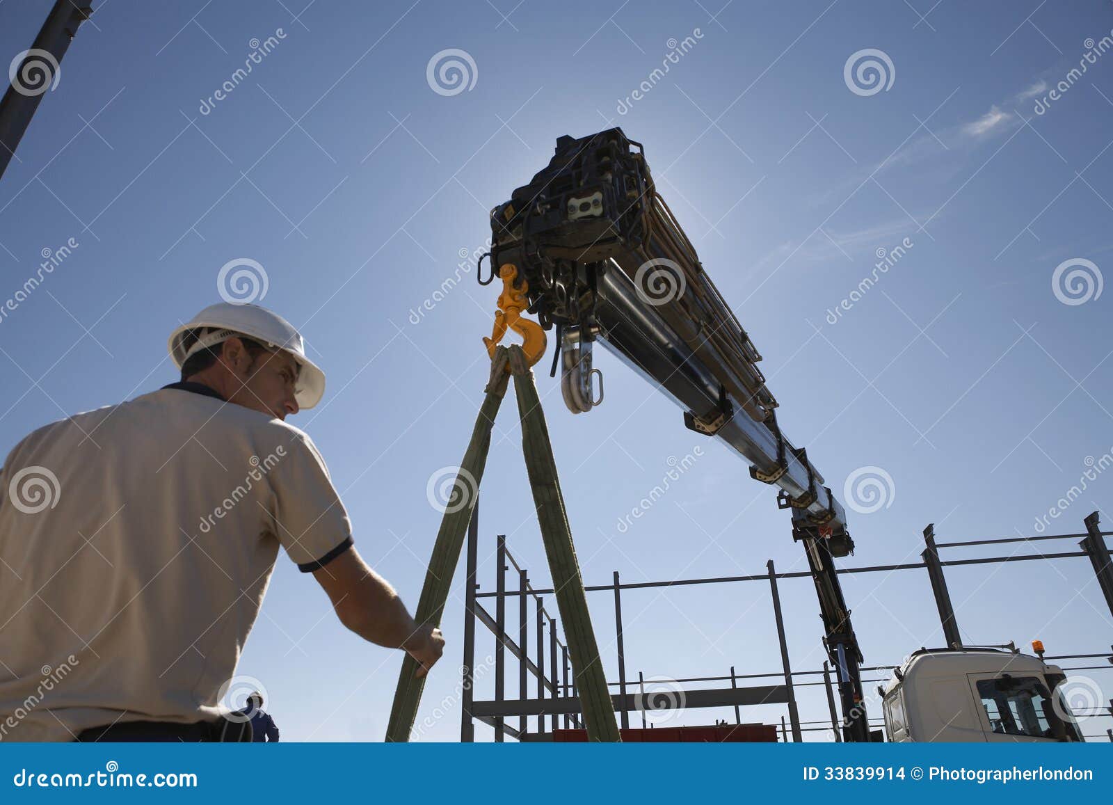 Construction Worker Unloading Material from Truck Stock Photo - Image ...
