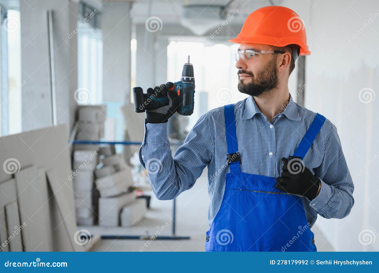 Construction Worker Use a Drill Bit Stock Photo - Image of renovation ...