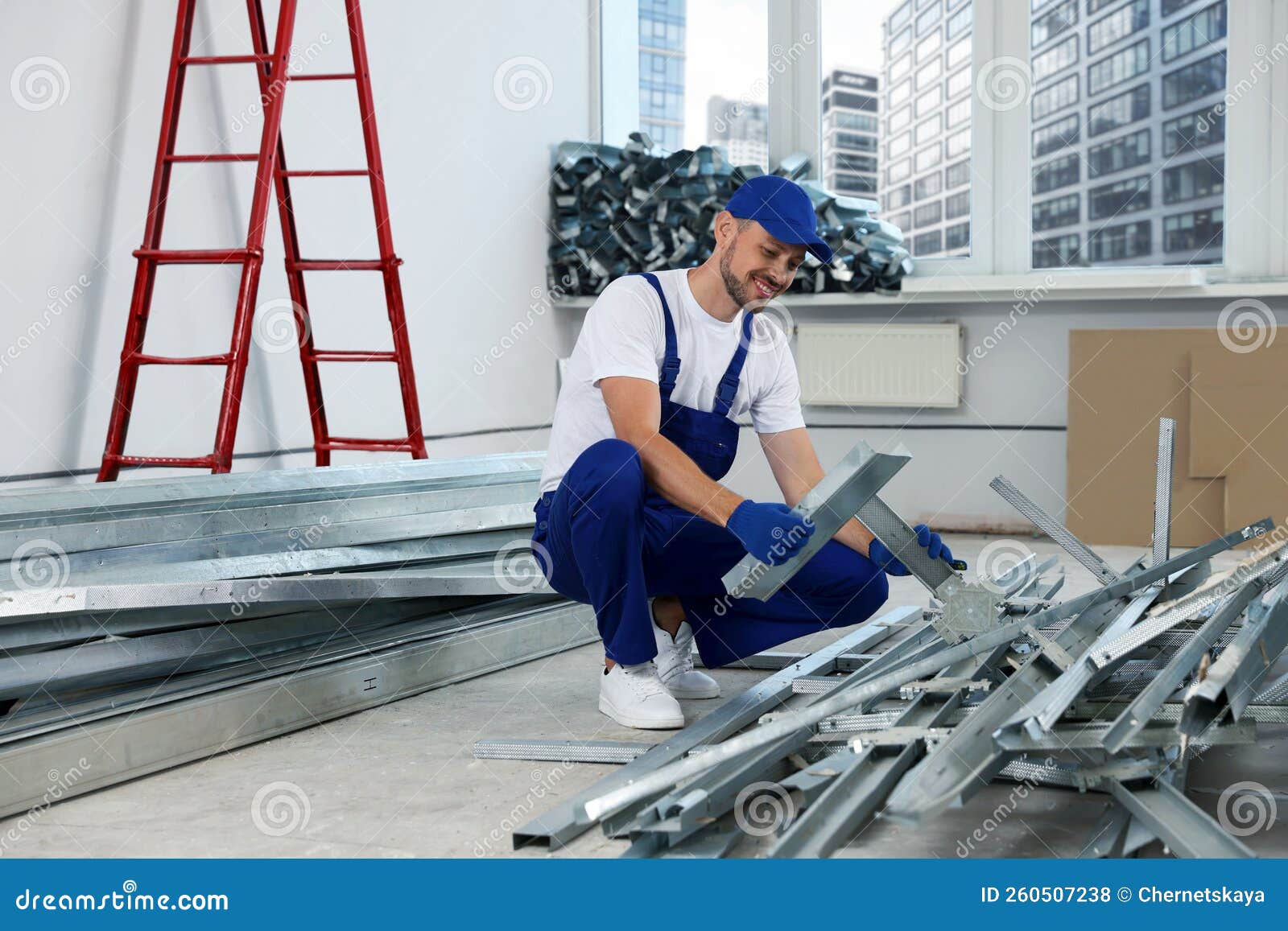 Construction Worker with Used Building Materials in Room Prepared for ...