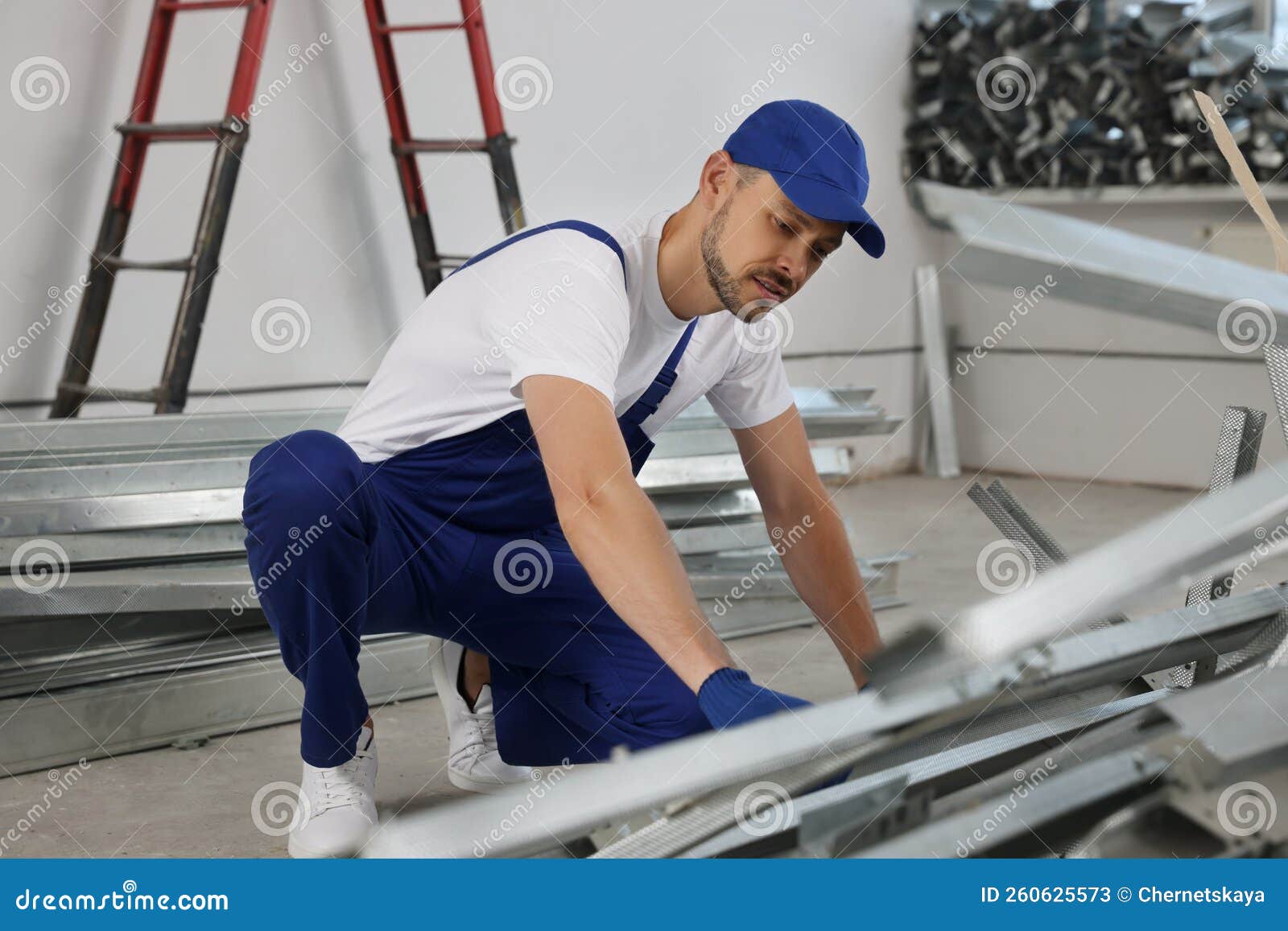 Construction Worker with Used Building Materials in Room Prepared for ...