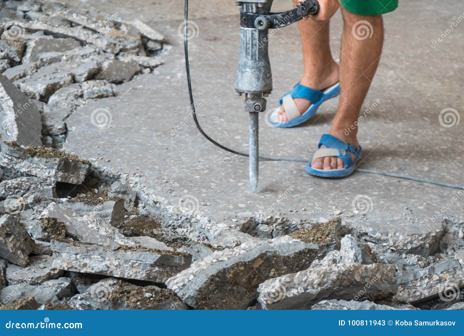 Construction Worker Using Concrete Drilling Machine in Construct Stock ...