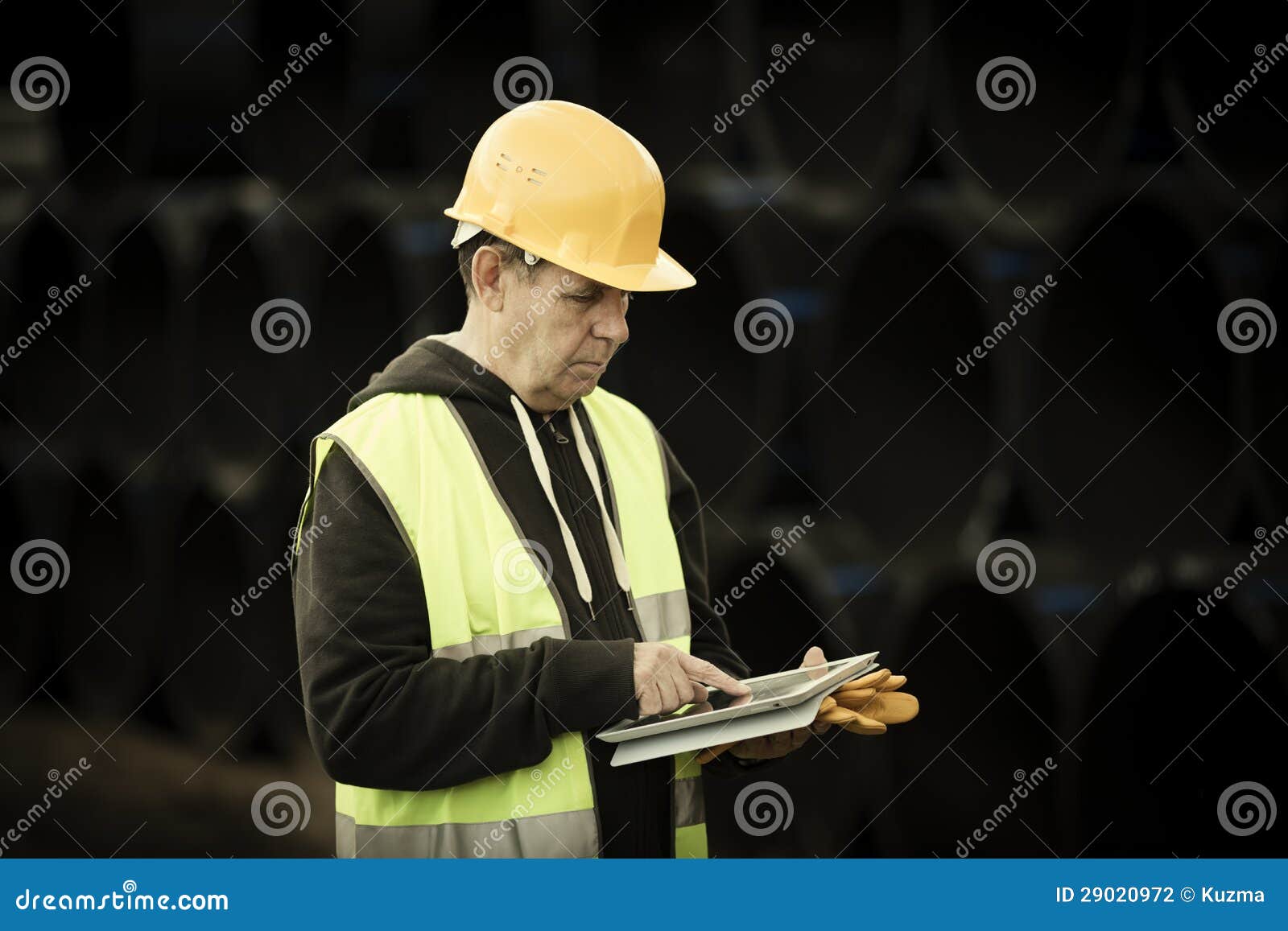 Construction Worker Using Digital Tablet Stock Photo - Image of looking ...
