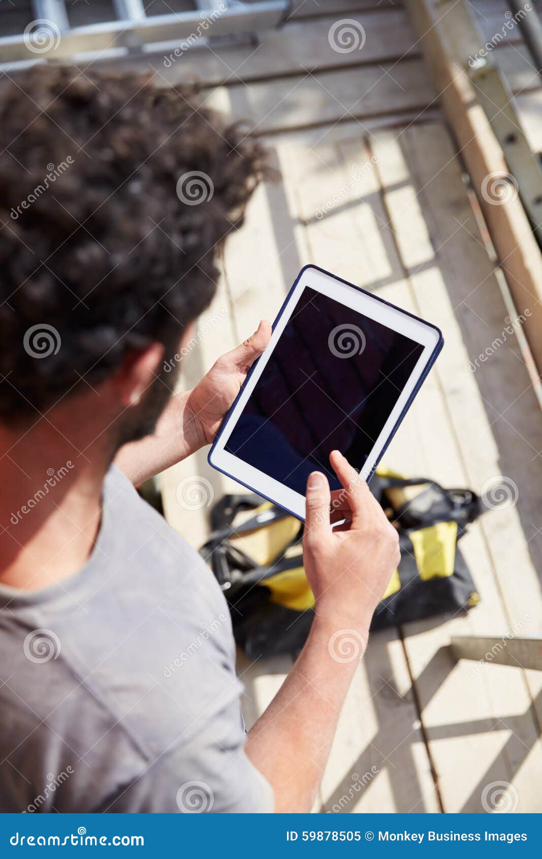 Construction Worker Using Digital Tablet on Building Site Stock Image ...