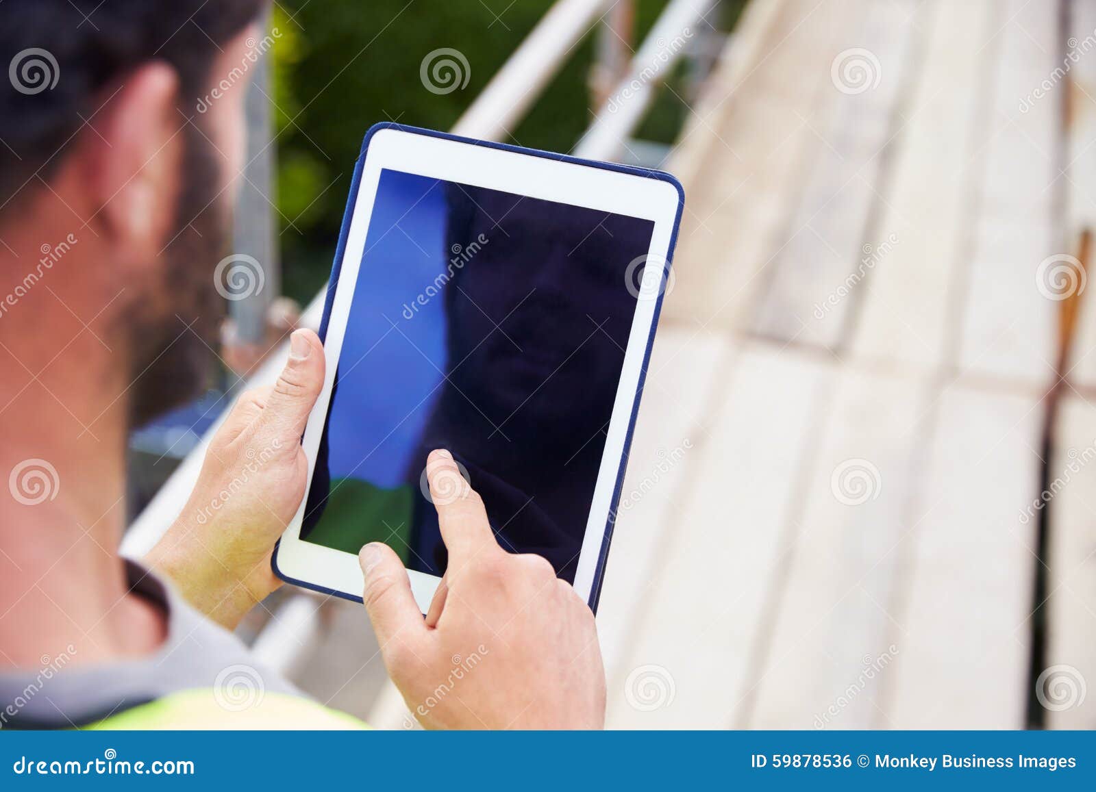 Construction Worker Using Digital Tablet on Building Site Stock Photo ...