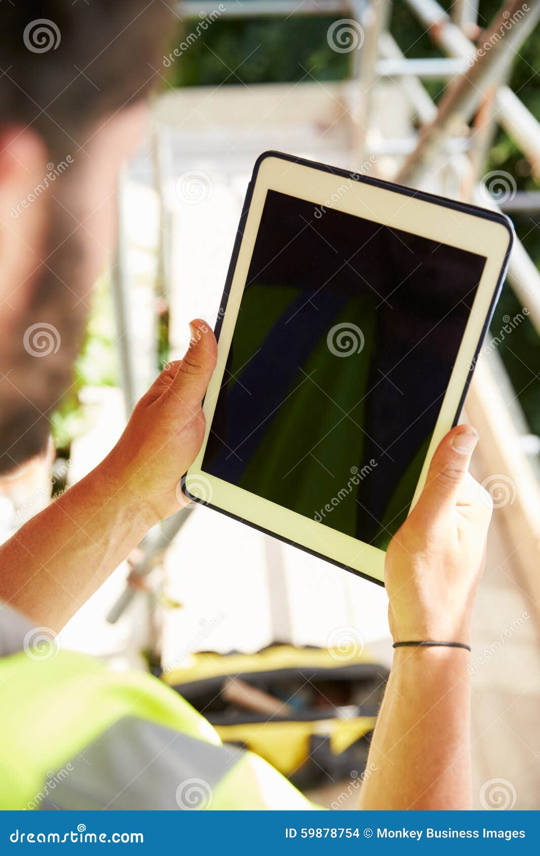 Construction Worker Using Digital Tablet on Building Site Stock Photo ...