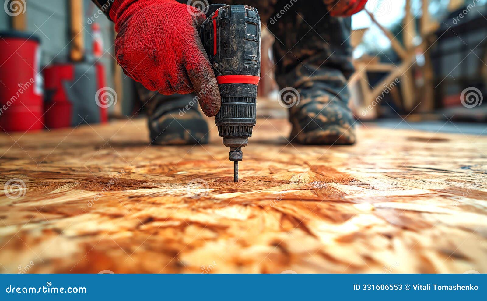 Construction Worker Using Electric Drill on Oriented Strand Board & X28 ...