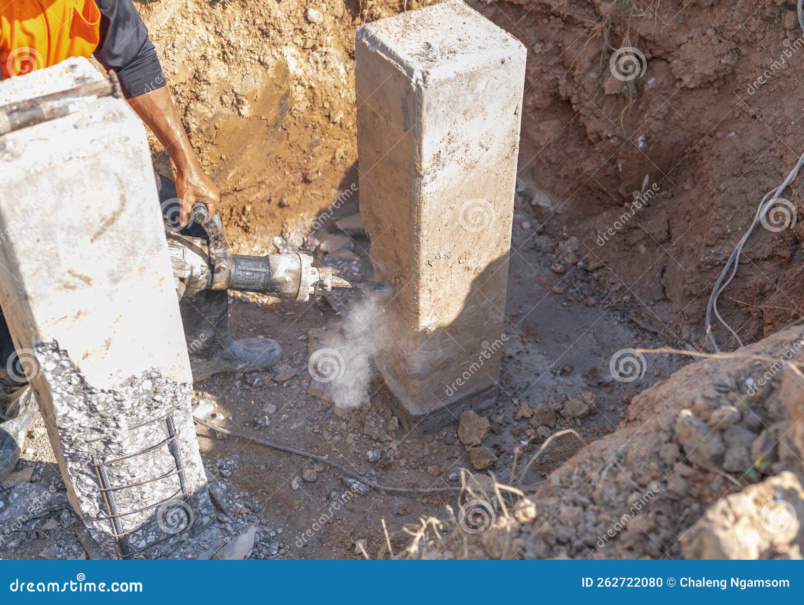 Construction Worker Using Electric Jackhammer Drill To Break Reinforced ...