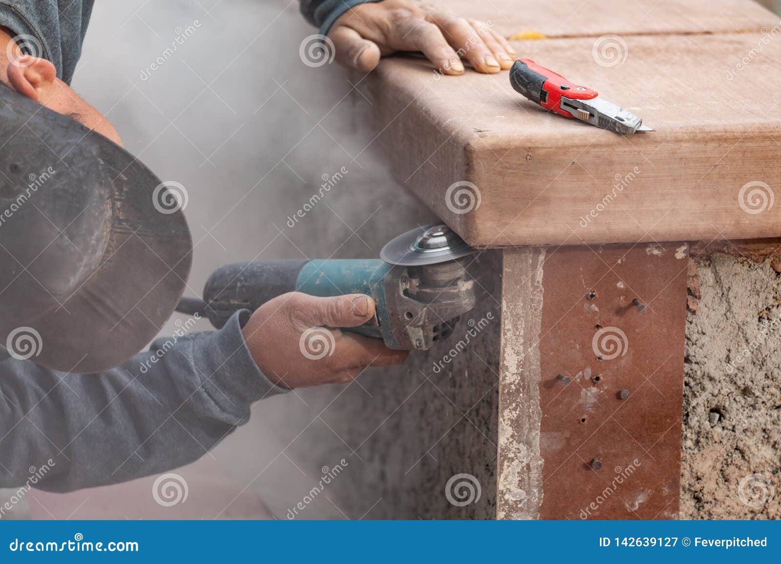 Construction Worker Using Grinder at Construction Site Stock Image ...