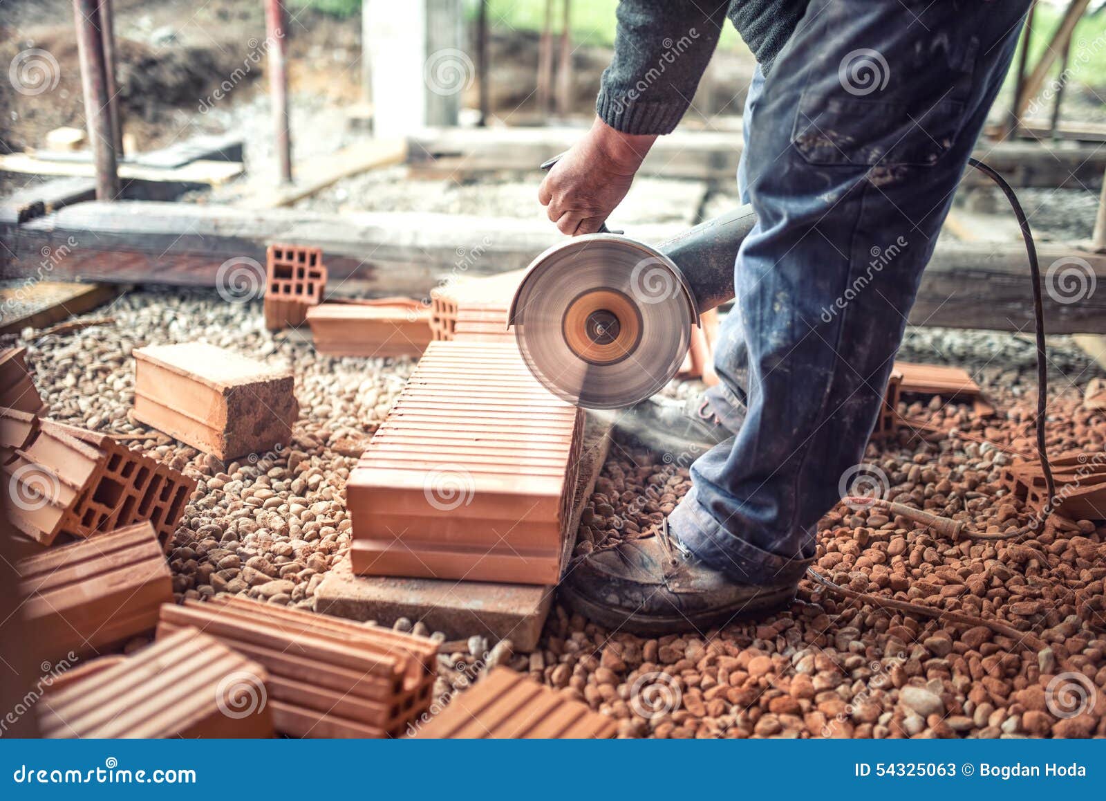 Construction Worker Using An Grinder For Cutting And Sawing ...
