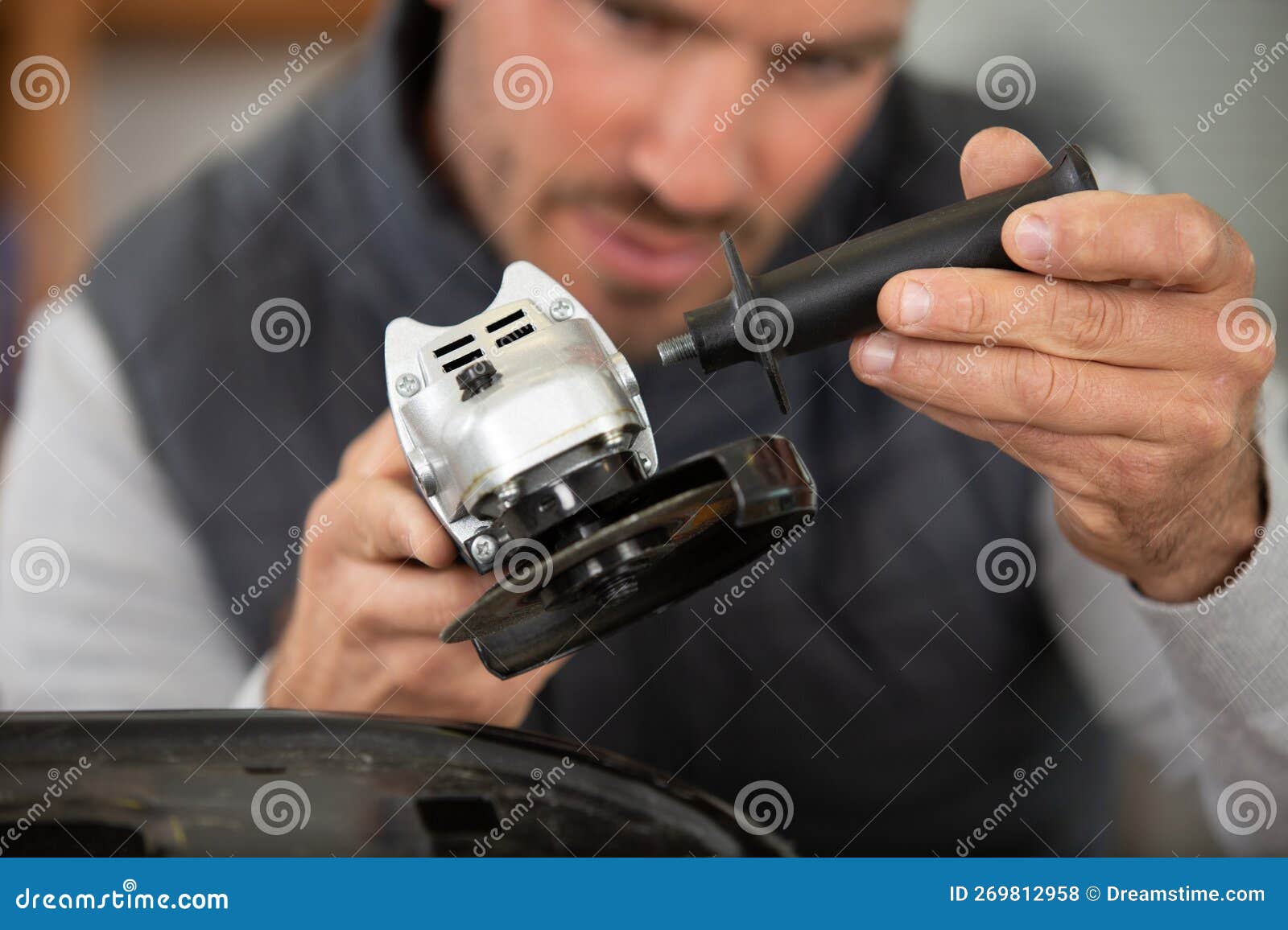 Construction Worker Using Handheld Circular Saw Stock Photo - Image of ...