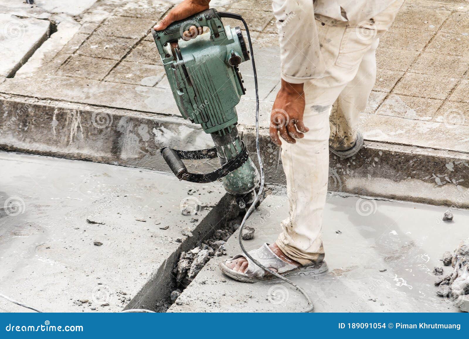 Worker Using Jackhammer Drilling Concrete Surface Stock Photo - Image ...