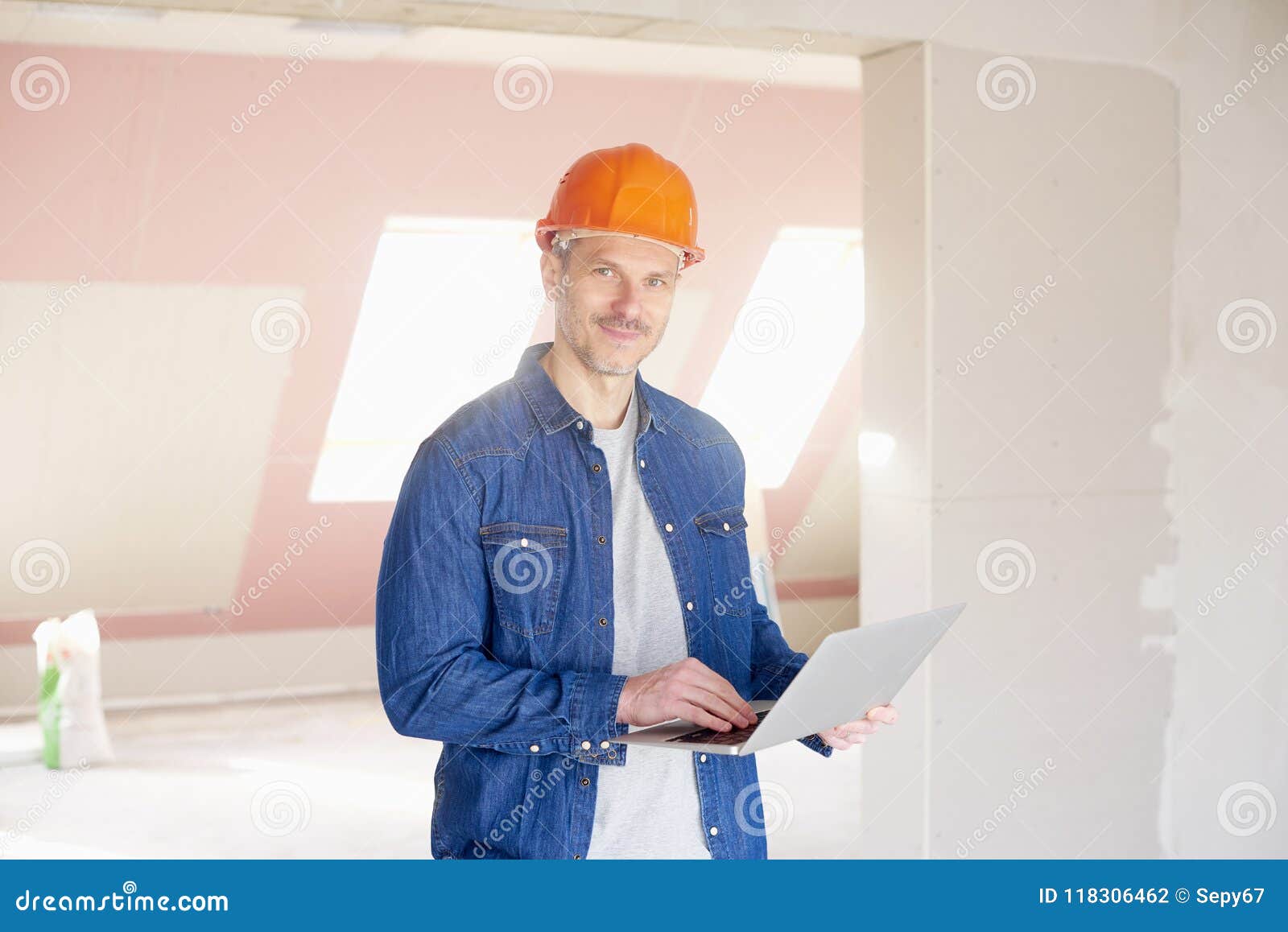 Construction Worker Using Laptop Stock Photo - Image of house ...
