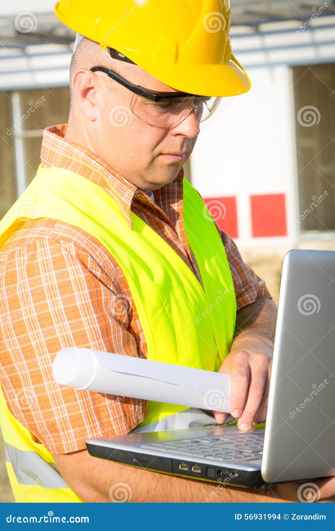 Construction Worker Using Laptop Stock Photo - Image of phone ...