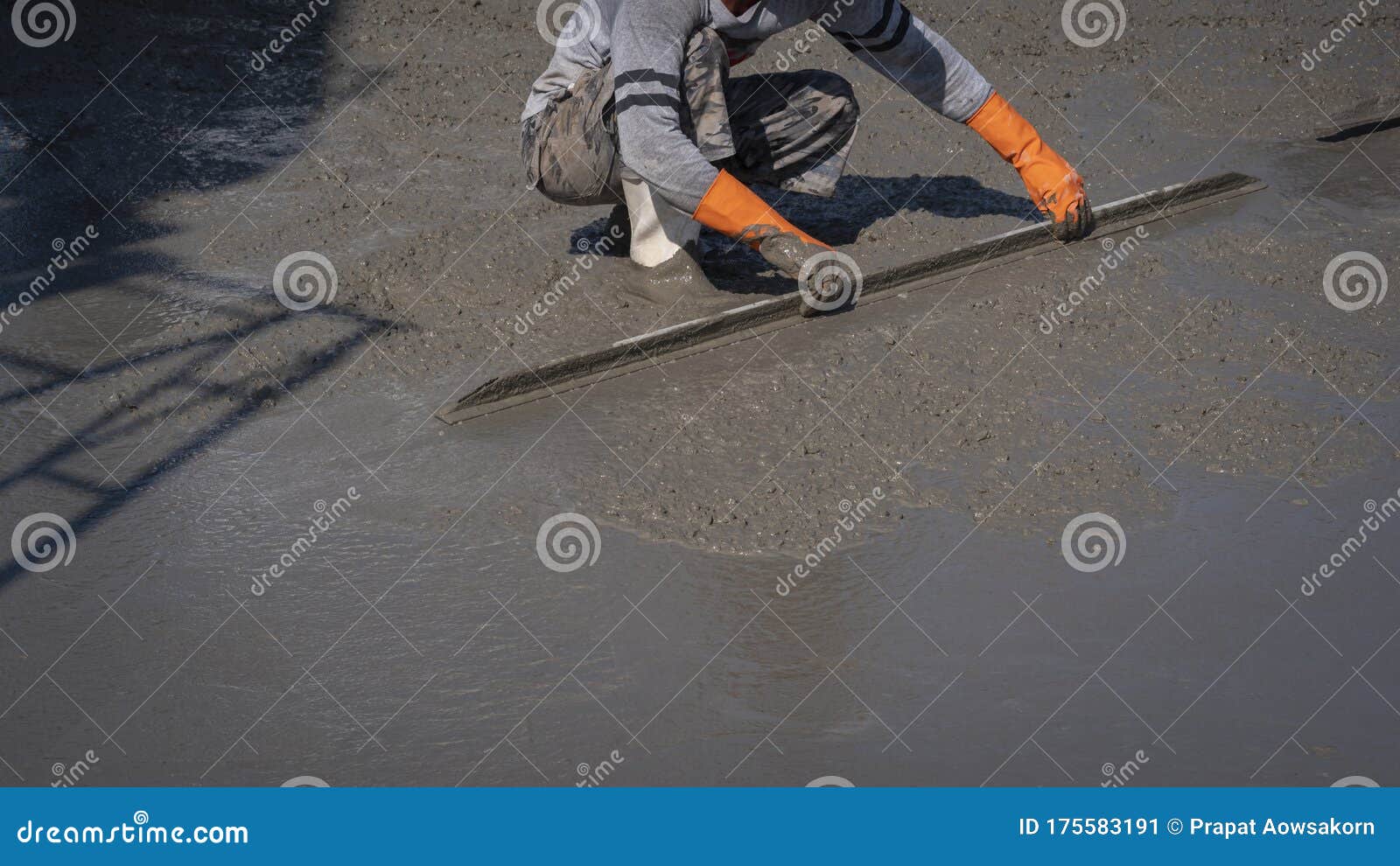 Construction Worker Using Long Triangle Trowel To Plastering Cement on ...