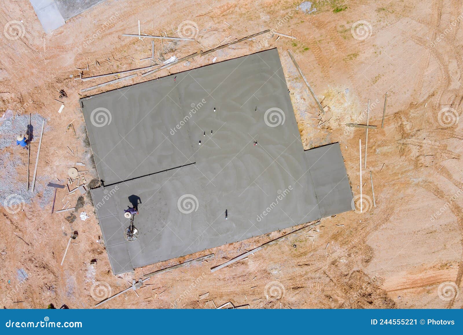 Construction Worker Grinding Cement Screed Foundation on New House ...