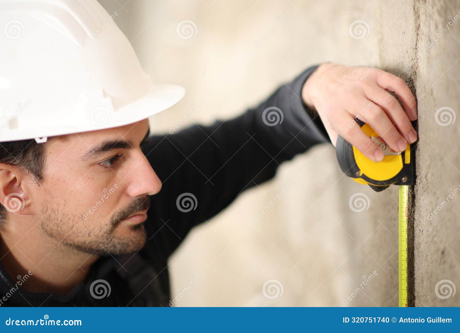Construction Worker Using Measuring Meter Stock Photo - Image of ...