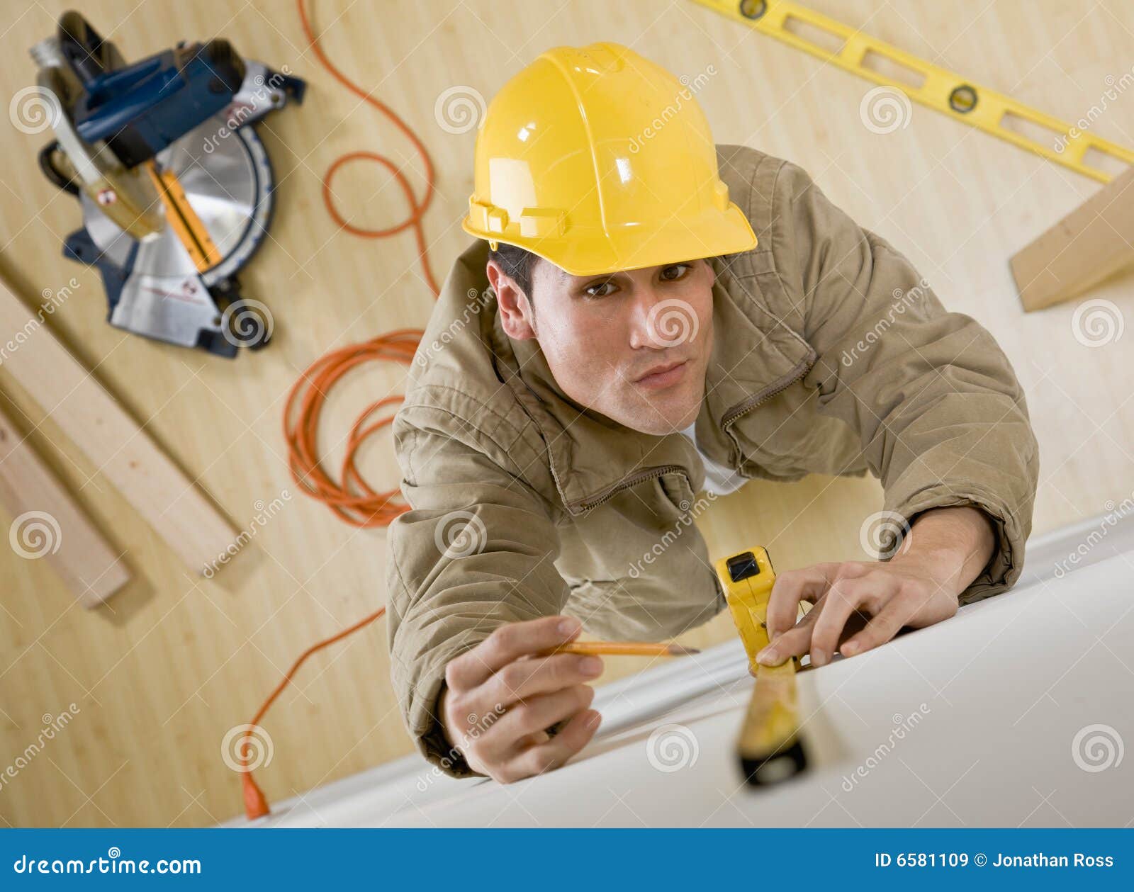 Construction Worker Using Measuring Tape Stock Image - Image of ...