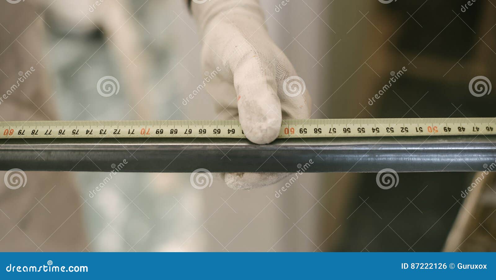 Construction Worker Using Measuring Tape Stock Photo - Image of ...