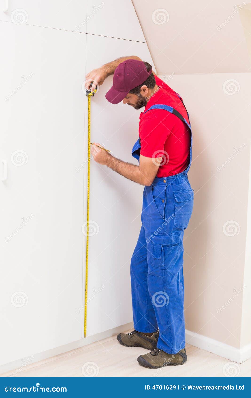 Construction Worker Using Measuring Tape Stock Image - Image of ...